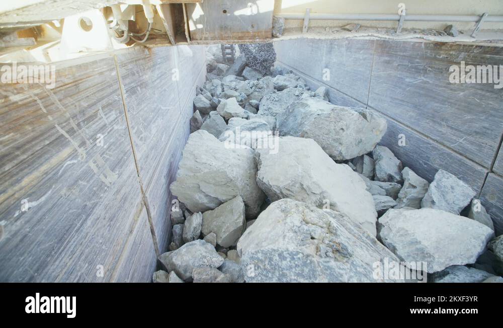 Rocks boulders moving on sorting conveyor belt at mining area Stock ...