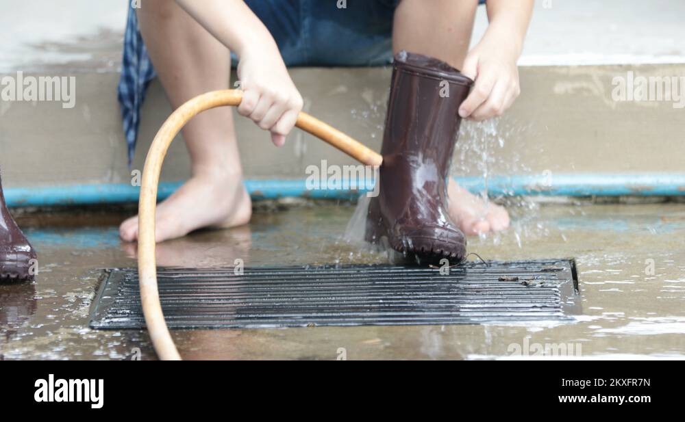 Boy and the boot Stock Videos & Footage - HD and 4K Video Clips - Alamy