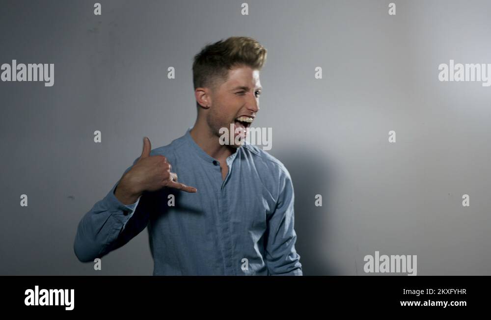 Portrait of a Male Model: Various Hand Gestures and Facial Expressions ...
