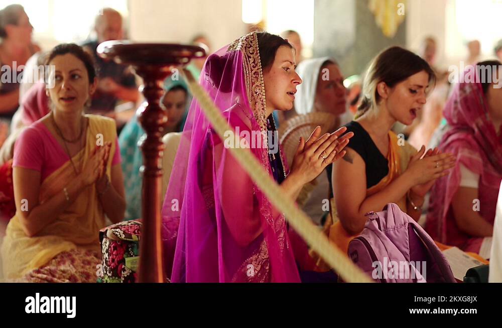 Women in Hindu traditional costumes in the Krishna temple Stock Video ...
