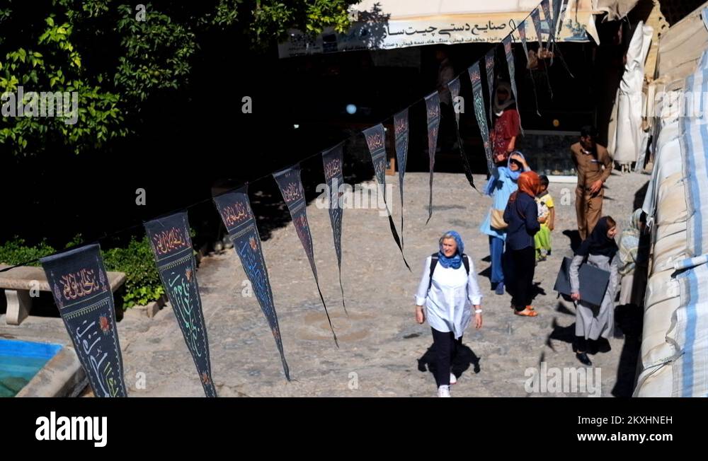 The alley of Saraye Moshir Bazaar with the black flags of Ashura ...