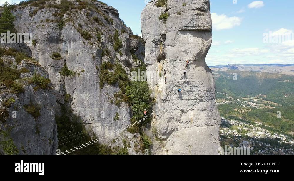 Suspension Bridge Across Steep Rock Formations and Valley Stock Video ...