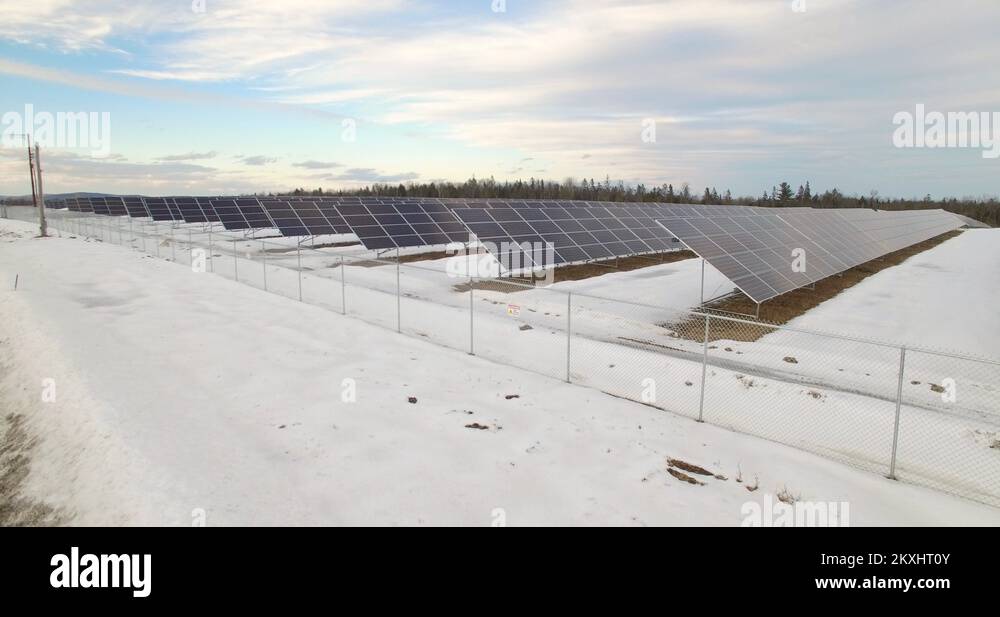Solar farm afternoon in the winter with beautiful blue sky and fluffy ...