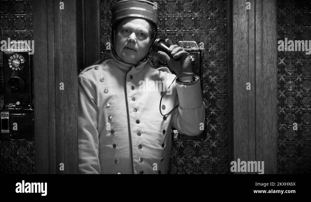 1930s bellhop in a vintage phone booth 4k Stock Video Footage - Alamy