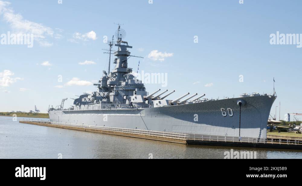 USS Alabama BB-60 Static view of a naval gunboat docked at a quay Stock ...