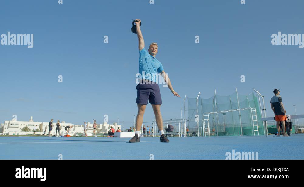 Man raises one arm Stock Videos & Footage - HD and 4K Video Clips - Alamy