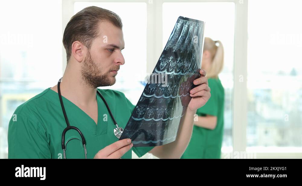 Medical Doctor Man Examining a Spine Mri Team Work Activity Hospital ...