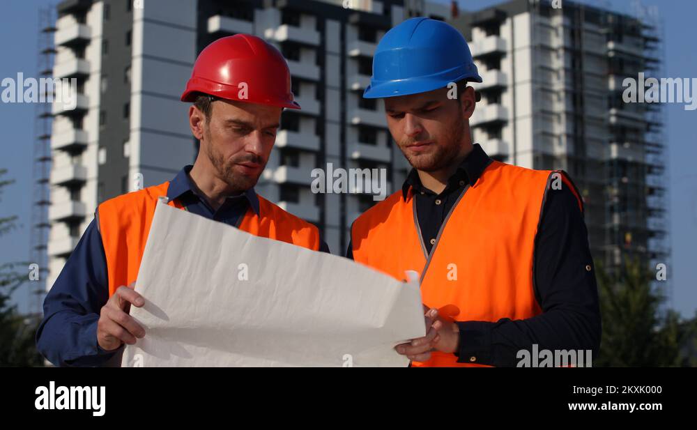 Architect Expert Engineers Talk and Analyze Design Plan Under ...