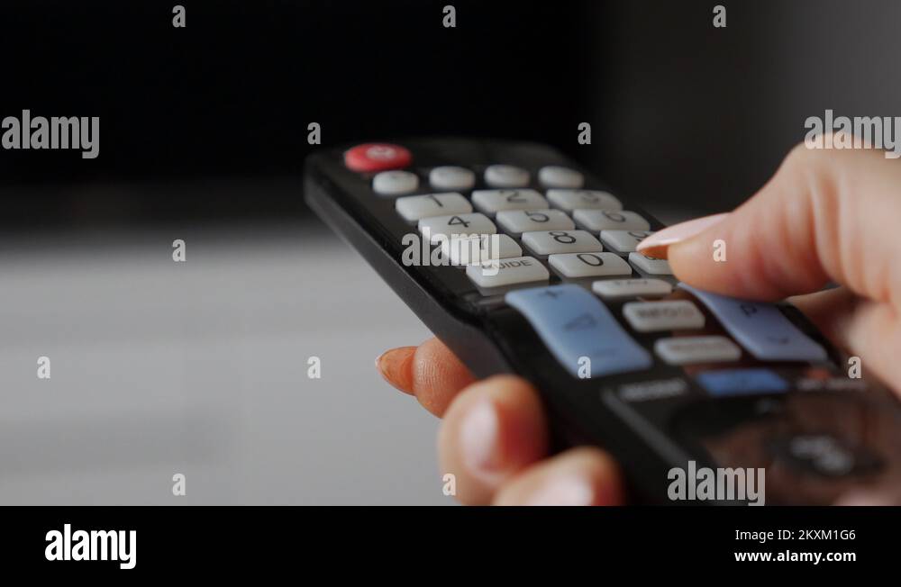 Using remote control Stock Videos & Footage - HD and 4K Video Clips - Alamy