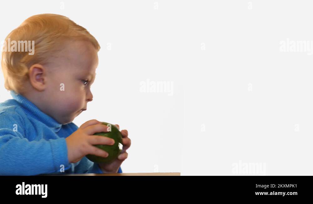 cute 1 year old baby taste new food white background Stock Video ...