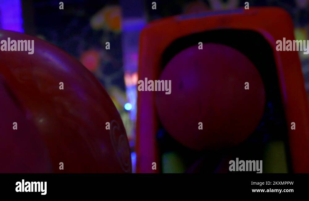 Bowling ball rolling on return system Stock Video Footage - Alamy