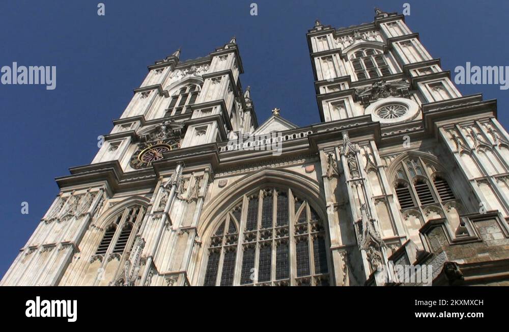 Tilt up to the tall towers of Westminster Abbey London England UK Stock ...