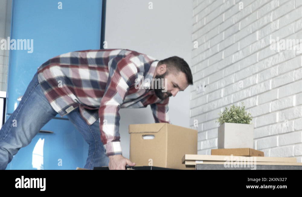 Man carrying heavy boxes moving Stock Videos & Footage - HD and 4K ...