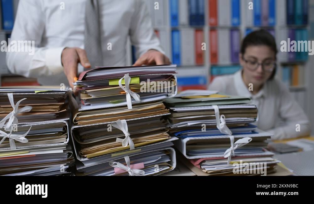 Paperwork piles Stock Videos & Footage - HD and 4K Video Clips - Alamy