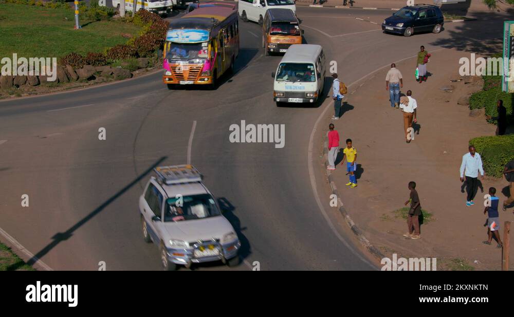 TRAFFIC PEDESTRIANS ROUNDABOUT NAIROBI KENYA Stock Video Footage - Alamy