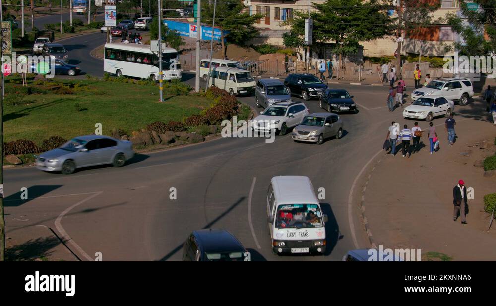 TRAFFIC PEDESTRIANS ROUNDABOUT NAIROBI KENYA Stock Video Footage - Alamy
