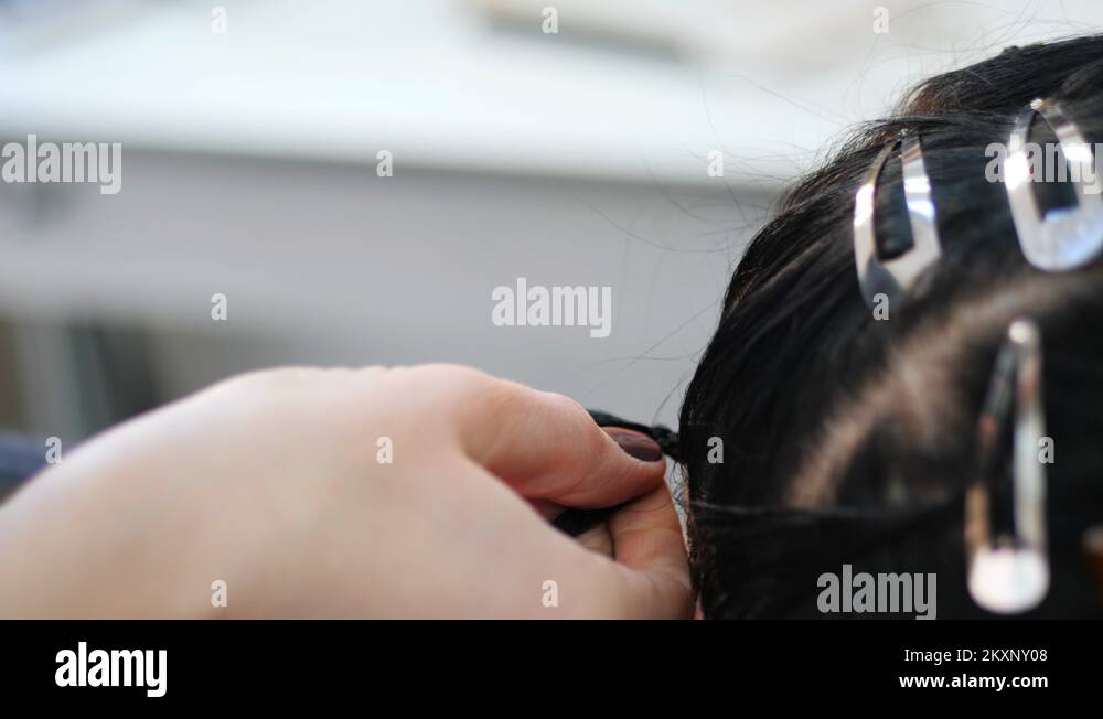 Process of weaving African braid with kanekalon. Small African braids ...