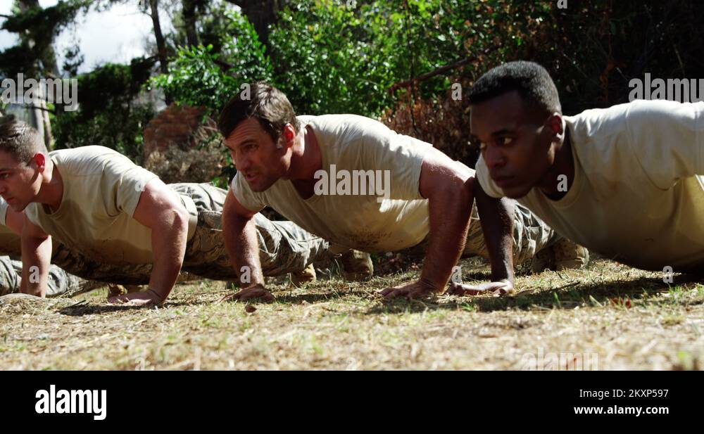 Military soldiers dosing push-ups during obstacle course 4k Stock Video ...