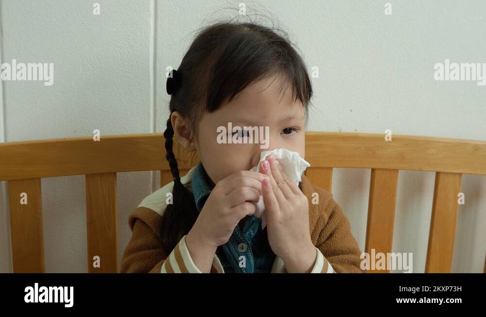 Girl flu using nose Stock Videos & Footage - HD and 4K Video Clips - Alamy