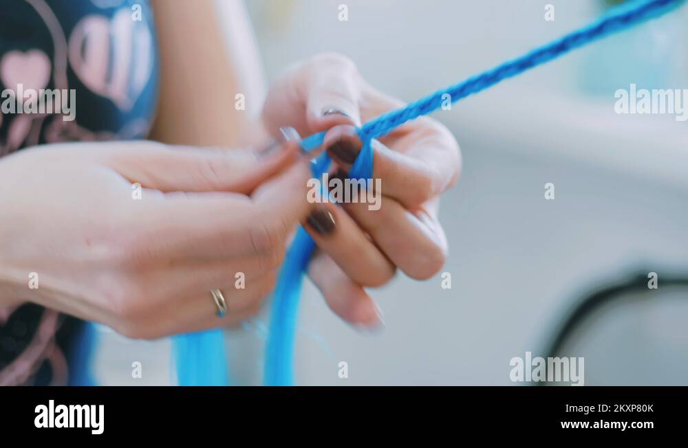 Process of weaving African braid with kanekalon. Small African braids ...