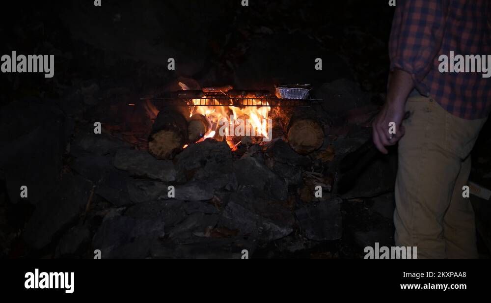 Man bbq burning Stock Videos & Footage - HD and 4K Video Clips - Alamy
