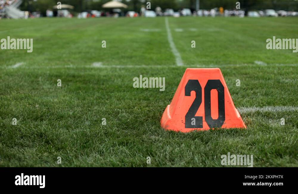 Pylon at 20 yard line of Football Field Stock Video Footage - Alamy