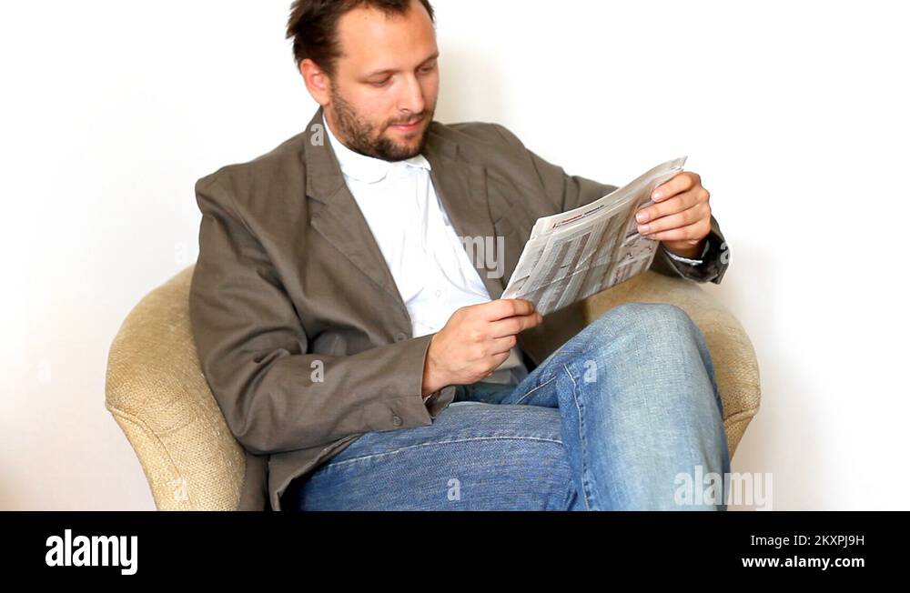 Man sitting reading newspaper Stock Videos & Footage - HD and 4K Video ...