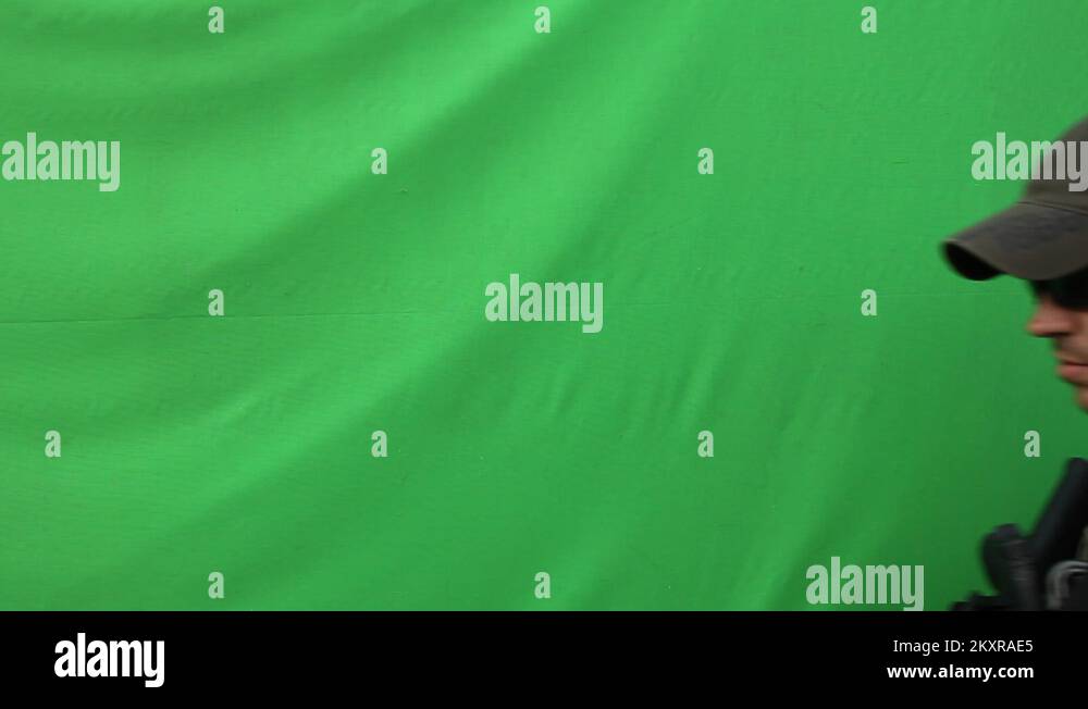 Special operations soldier scanning the area on green screen (HD) C ...