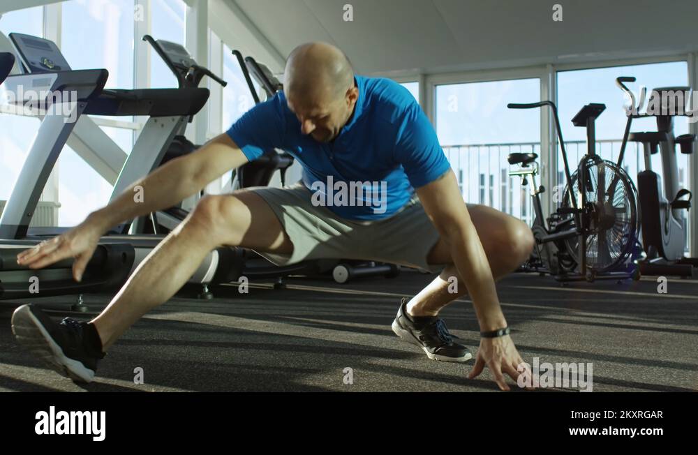 Man gym stretching not woman Stock Videos & Footage - HD and 4K Video ...