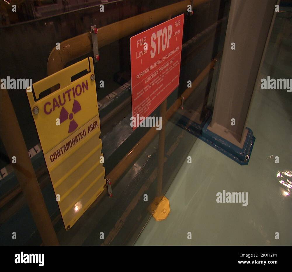 Warning signs inside nuclear power station Stock Video Footage - Alamy