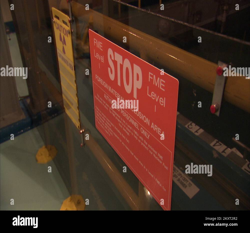 Warning signs inside nuclear power station Stock Video Footage - Alamy