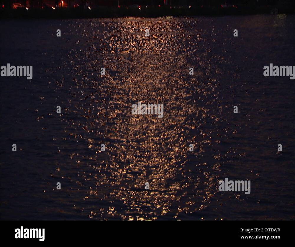 Boston skyline at night, pan from moonlit river to buildings Stock ...