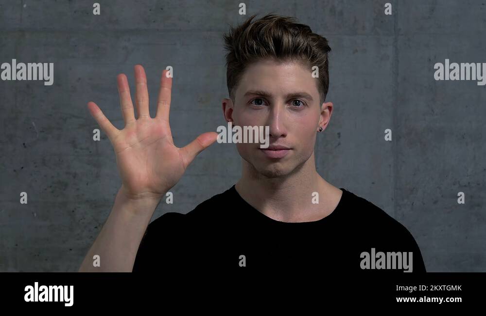 Male Actor Facial Expressions in Studio: Finger Countdown to Five Stock ...
