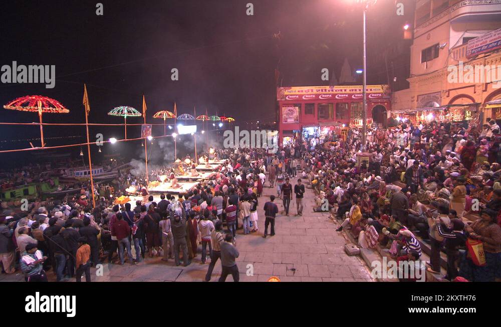 Wide overhead shot of Ganga Aarti ceremony and crowd, Varanasi, India ...