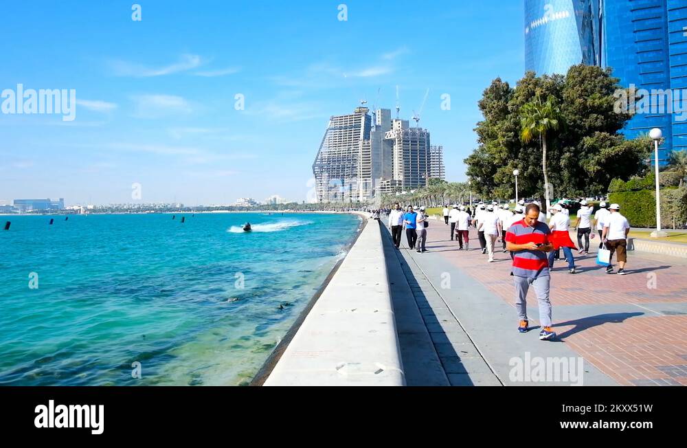 Daily walk along Corniche promenade in Doha, Qatar Stock Video Footage ...