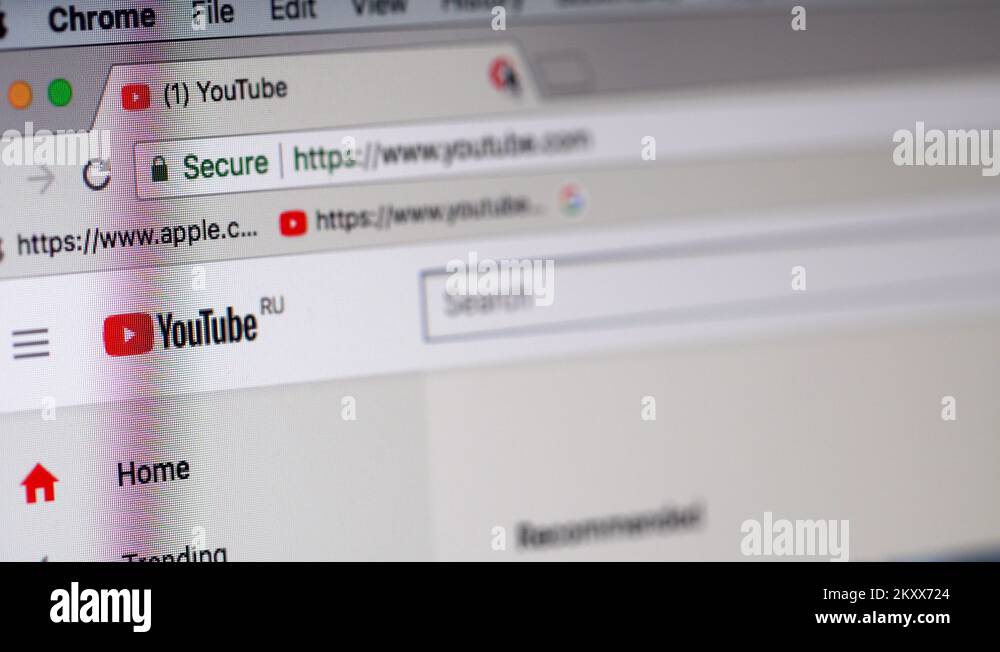 Youtube homepage displayed in browser on laptop monitor Stock Video ...