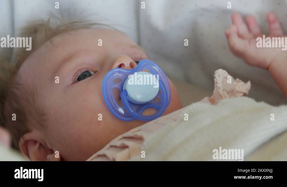 Pacifier on baby blanket Stock Videos & Footage - HD and 4K Video Clips ...
