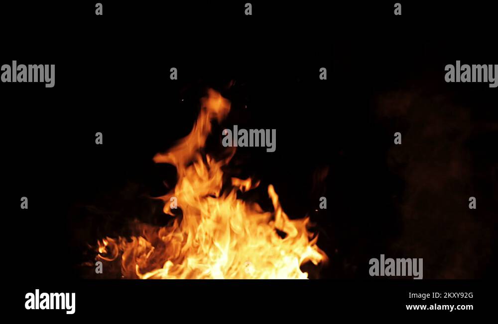 Real fire with smoke on black background Stock Video Footage - Alamy