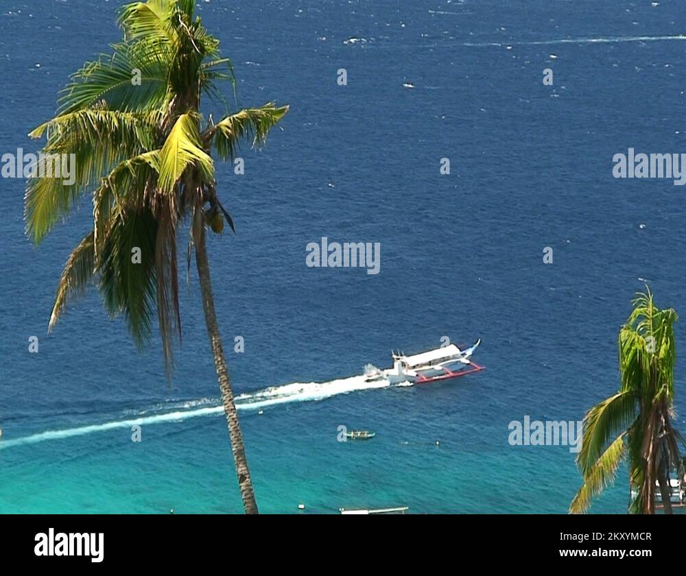Traditional filipino Banka outrigger boat on the ocean in Philippines ...