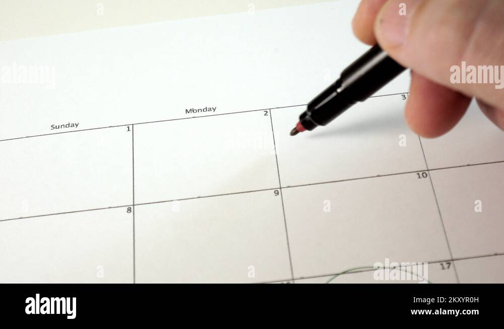 Sign the day in the calendar with a pen, draw a good bad day Stock ...