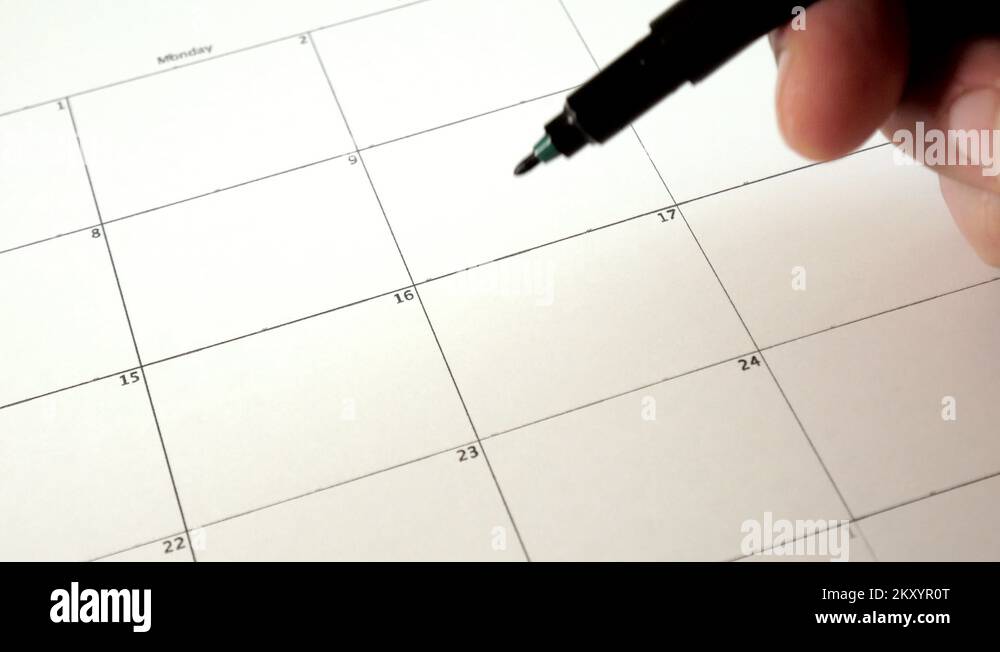 Sign the day in the calendar with a pen, draw a good bad day Stock ...