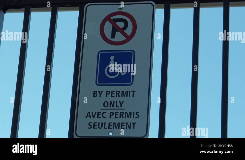 Parking for Disabled Only (handicapped symbol) in English and French ...