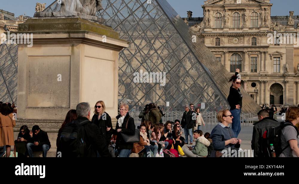 France Paris Pyramids And The Building Of Louvre Museum, Tourists tour ...