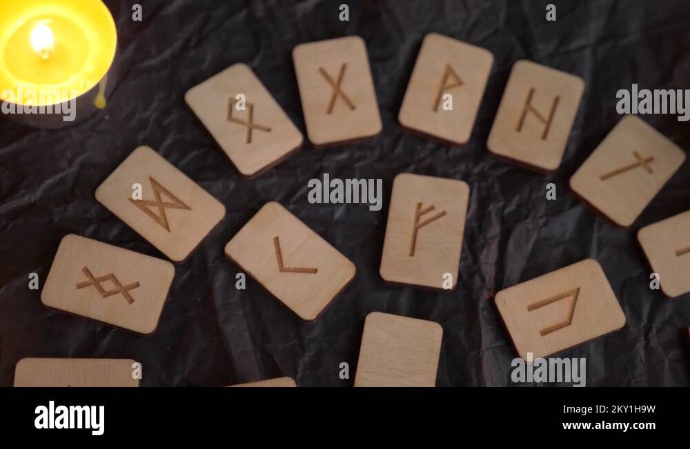 Wooden rune wheel. runic layout and candles, 4k, slow-motion shooting ...