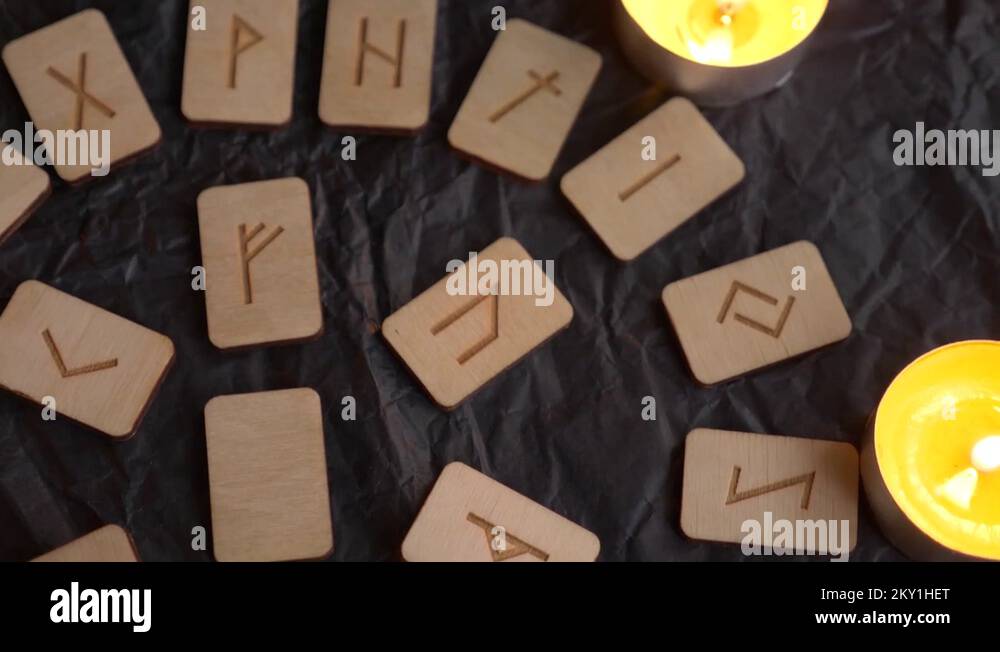 Wooden rune wheel. runic layout and candles, 4k, slow-motion shooting ...