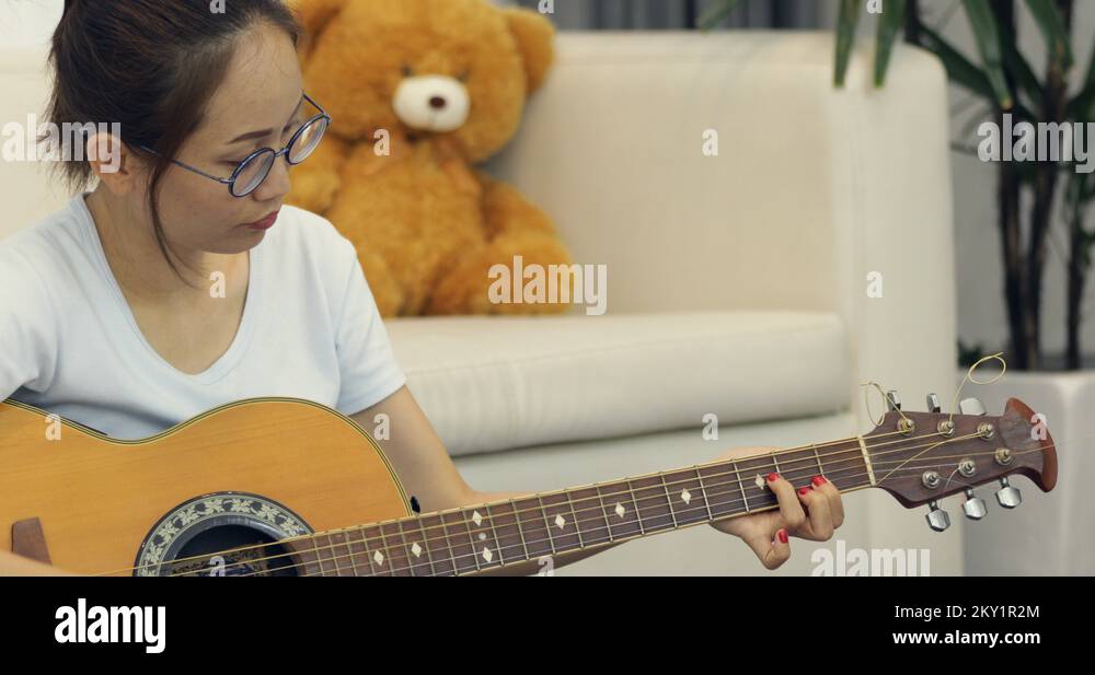 Asian girl sitting musical instrument Stock Videos & Footage - HD and ...