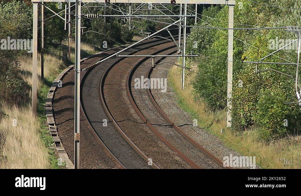 Pendolino tilting passenger train on a curve on the West Coast mainline ...