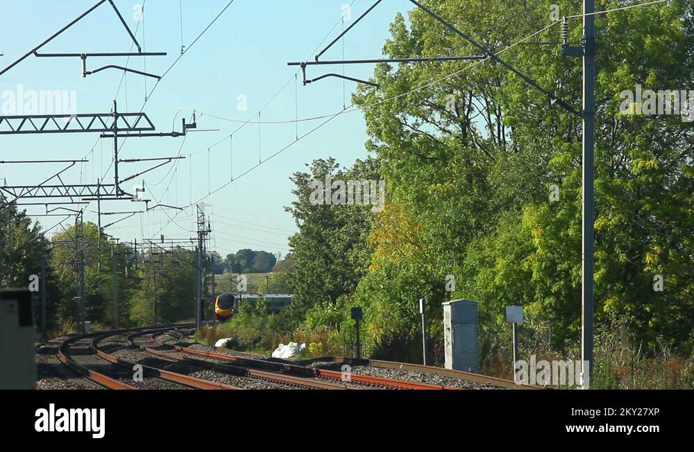 Pendolino tilting passenger train on a curve on the West Coast mainline ...