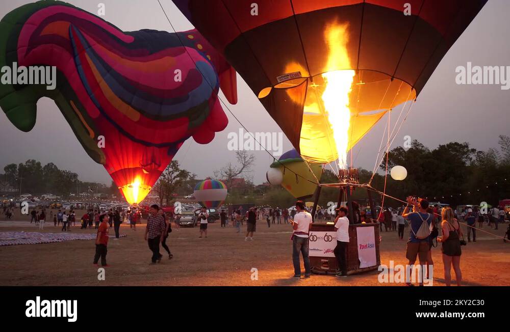 CHIANG MAI - CIRCA 2018: A balloon crew inflates the envelope of their ...