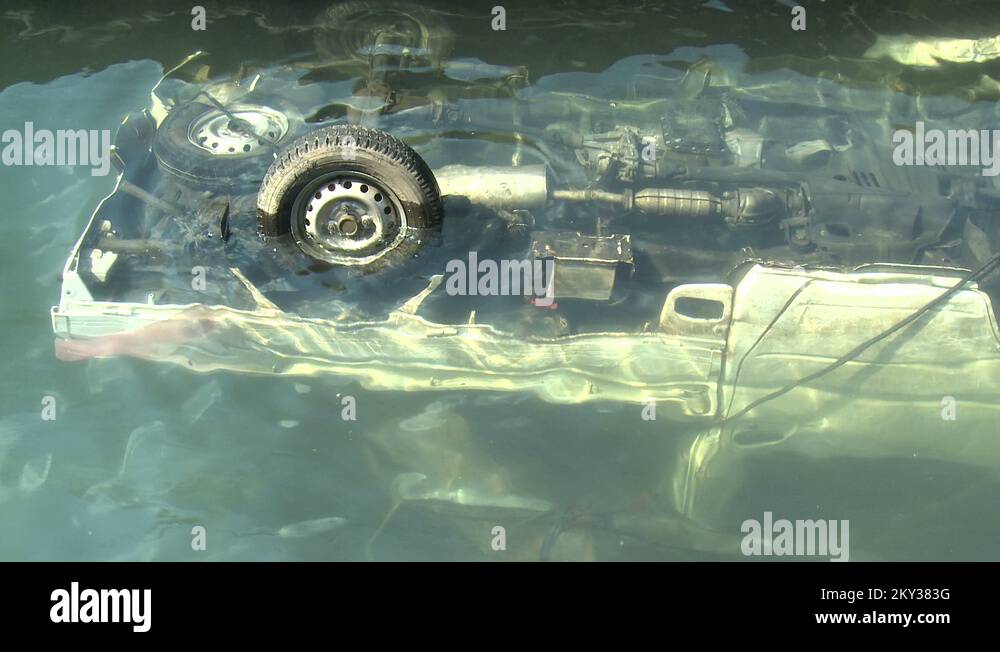 Japan Tsunami Aftermath - Van Lies Submerged In Sea In Kesennuma City ...